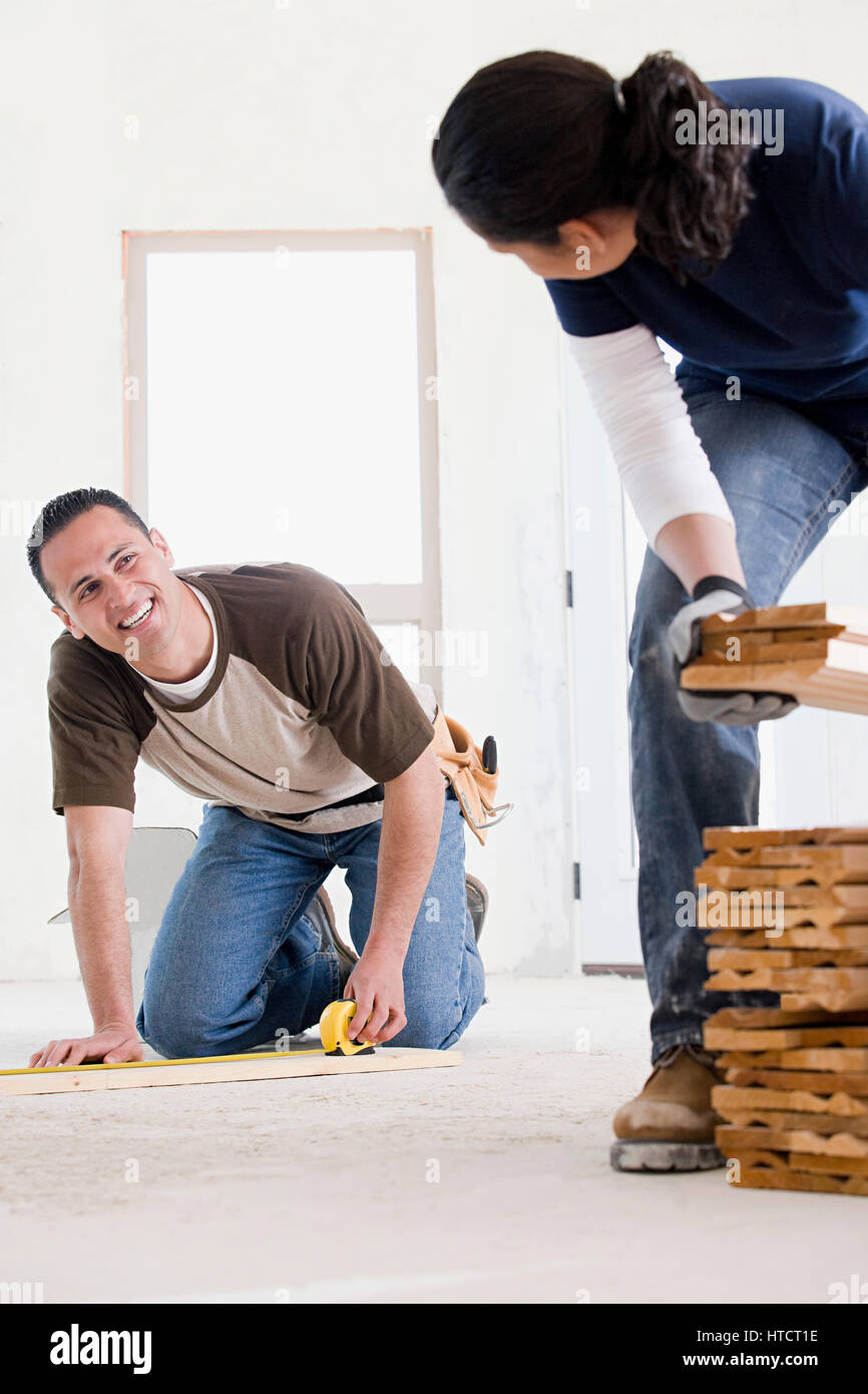 A couple building Stock Photo - Alamy