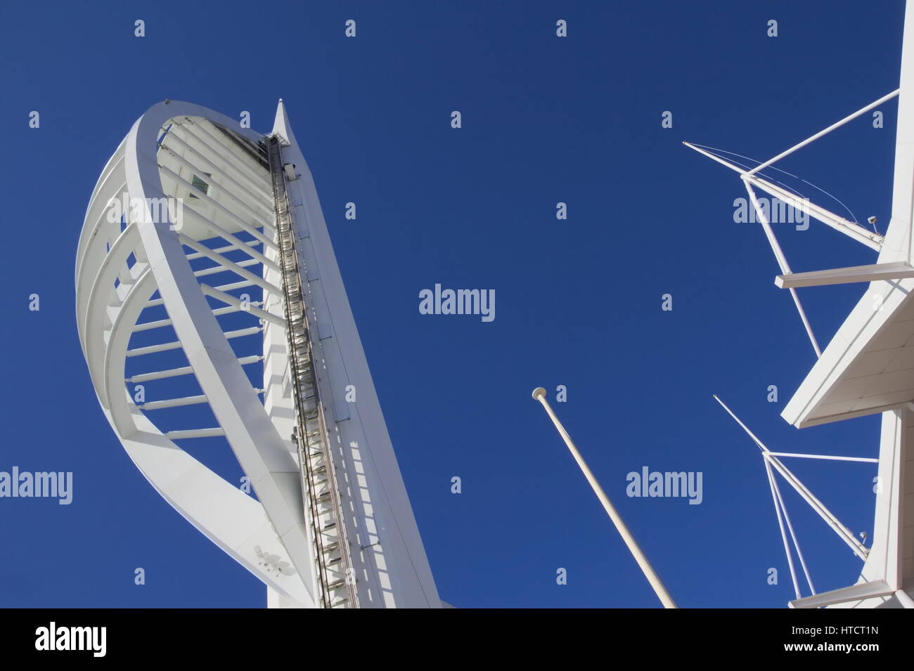 GUNWHARF KEYS, ENGLAND - MARCH 16 2016: Spinnaker Tower against blue ...