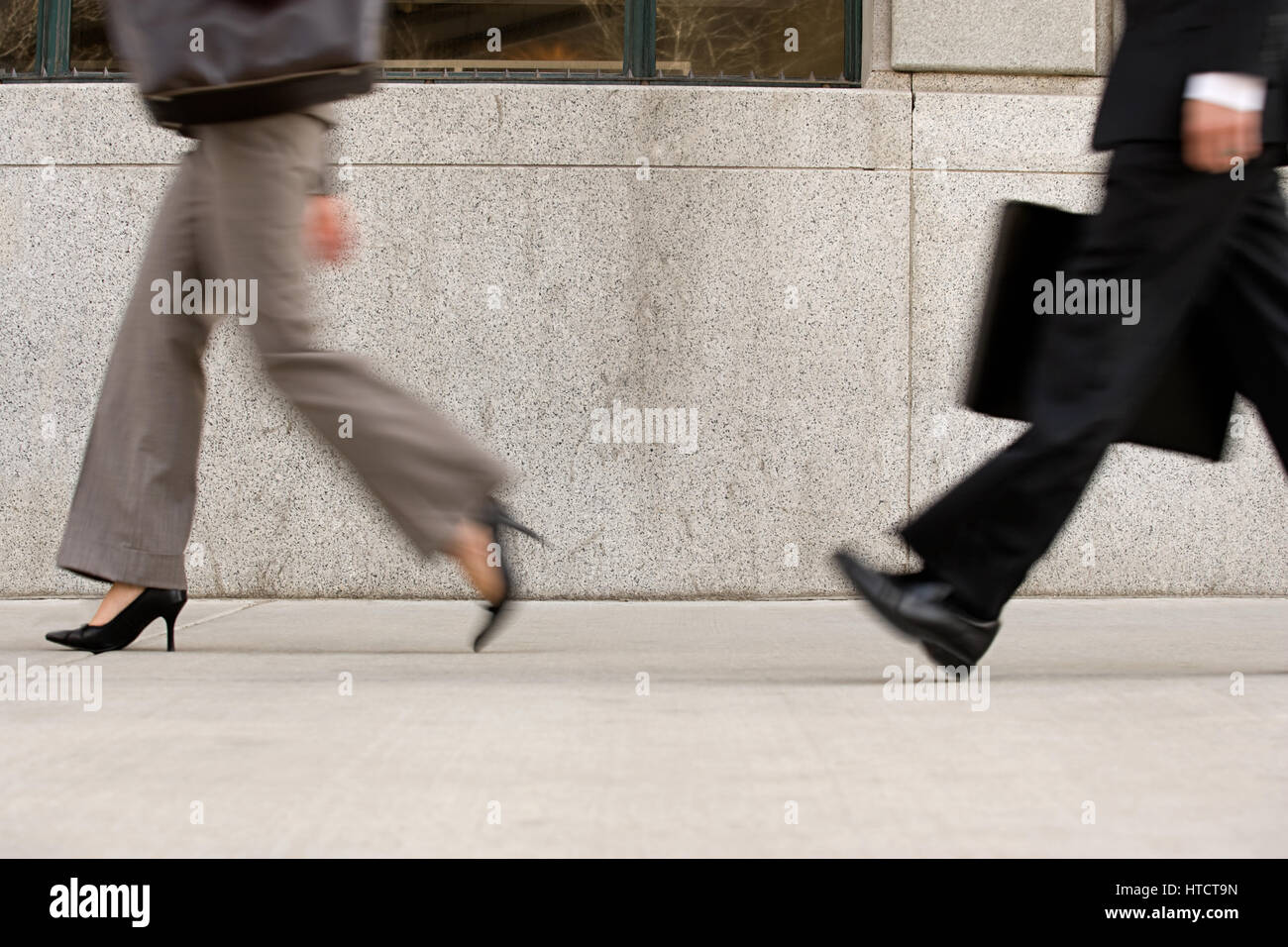 Two people walking busy street usa hi-res stock photography and images ...