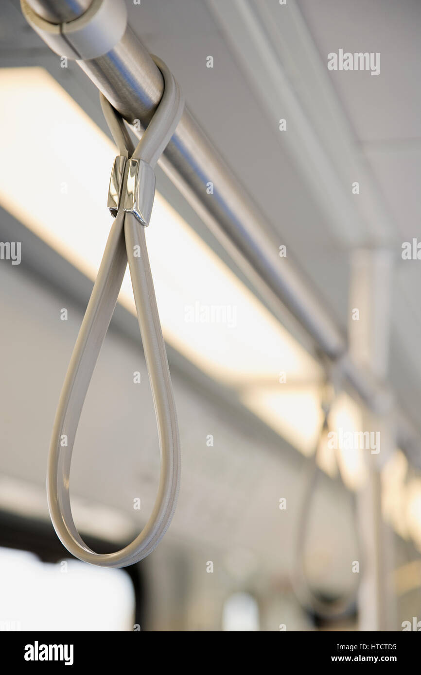 Handle on light rail Stock Photo - Alamy