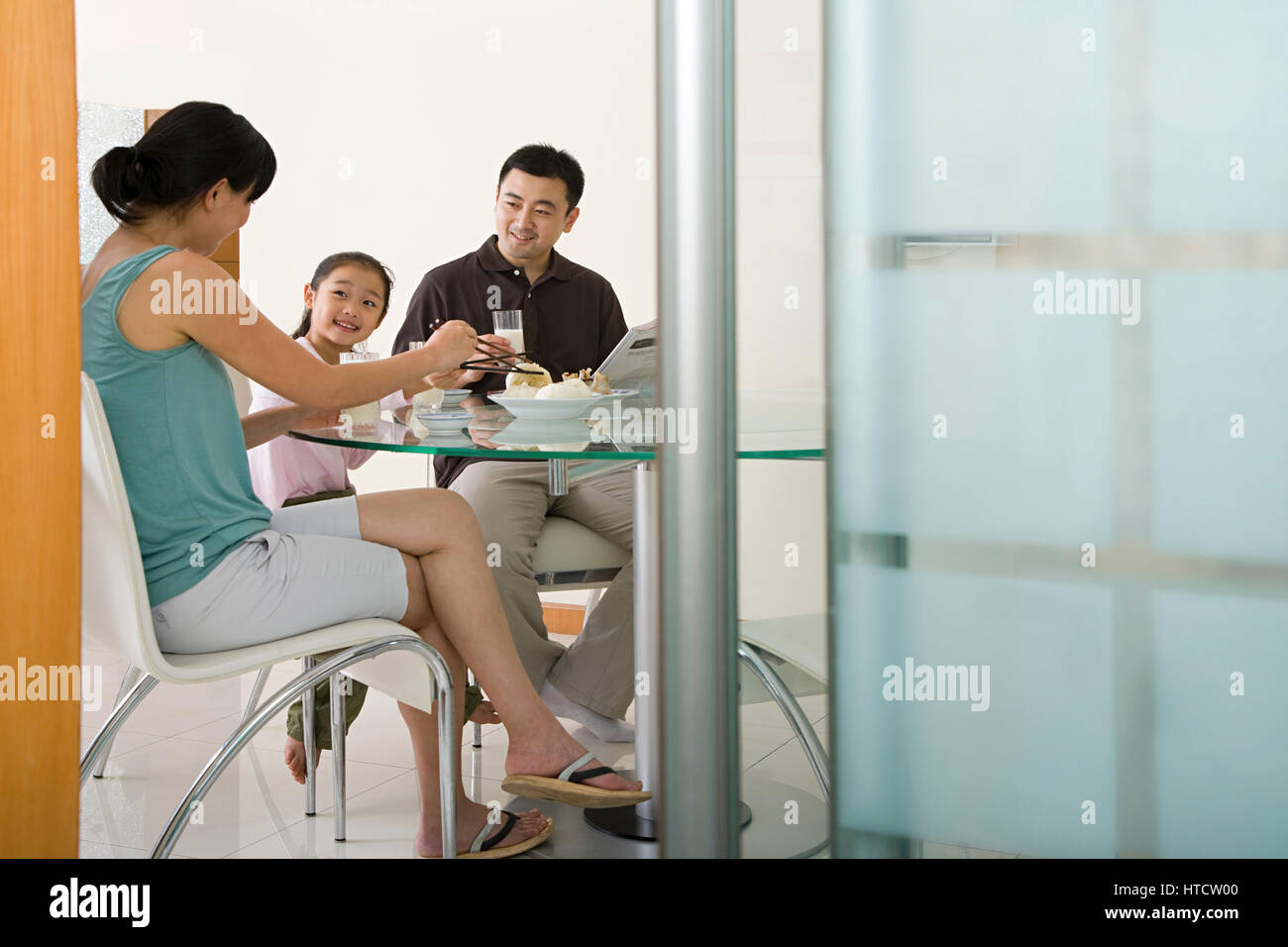 Family having a meal Stock Photo - Alamy