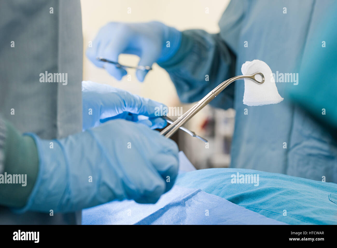 Surgeons performing operation Stock Photo - Alamy