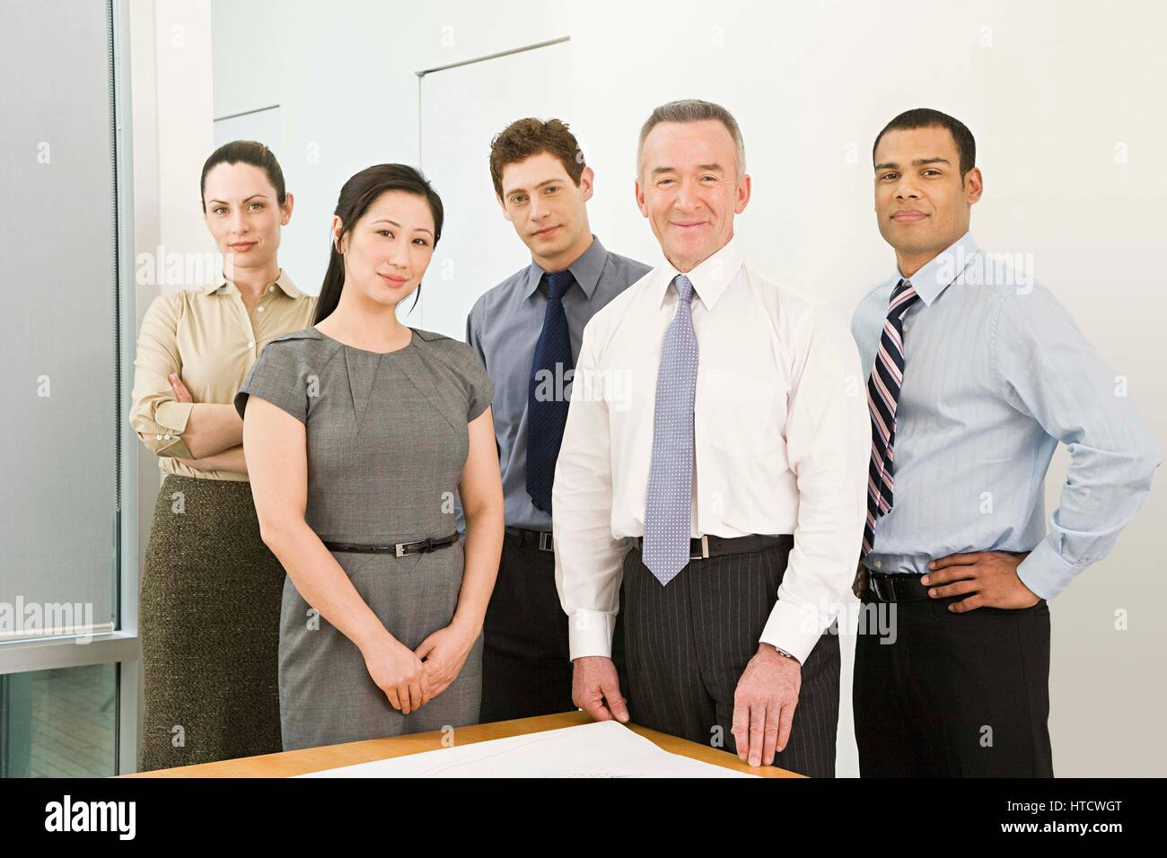Five colleagues posing hi-res stock photography and images - Alamy