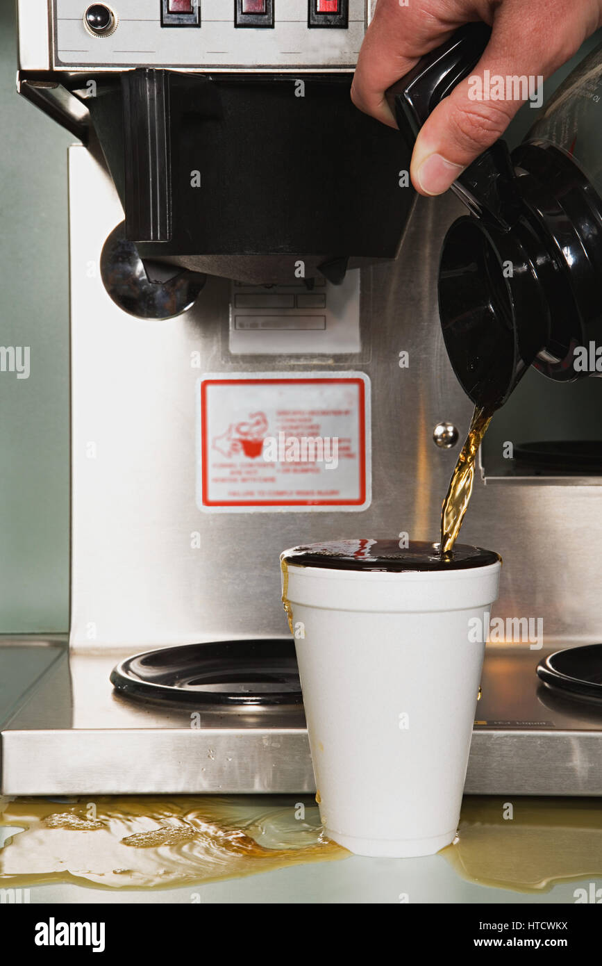 Pouring cup coffee coffee overflowing hi-res stock photography and ...