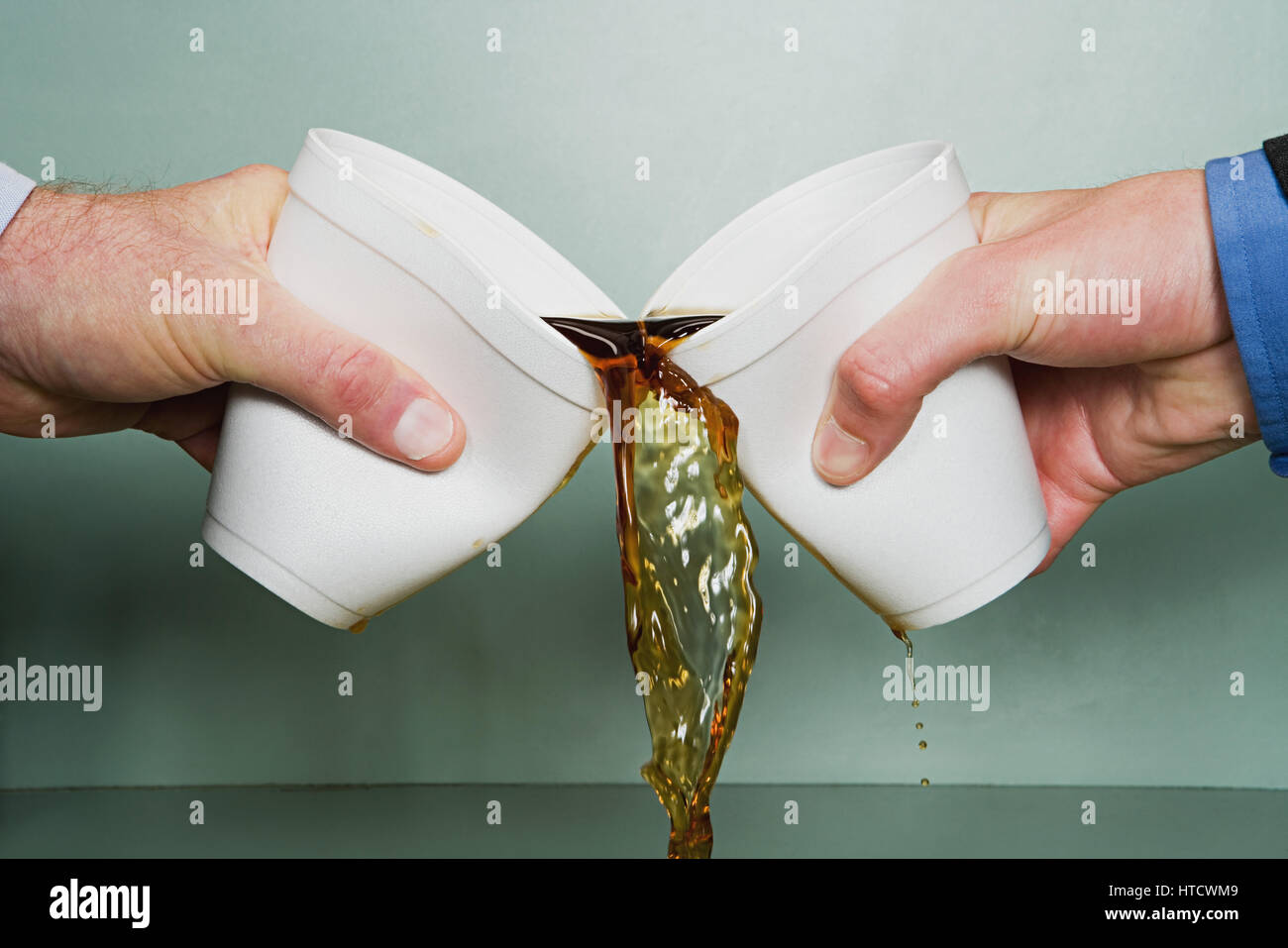 Pouring overflowing spilling hi-res stock photography and images - Alamy