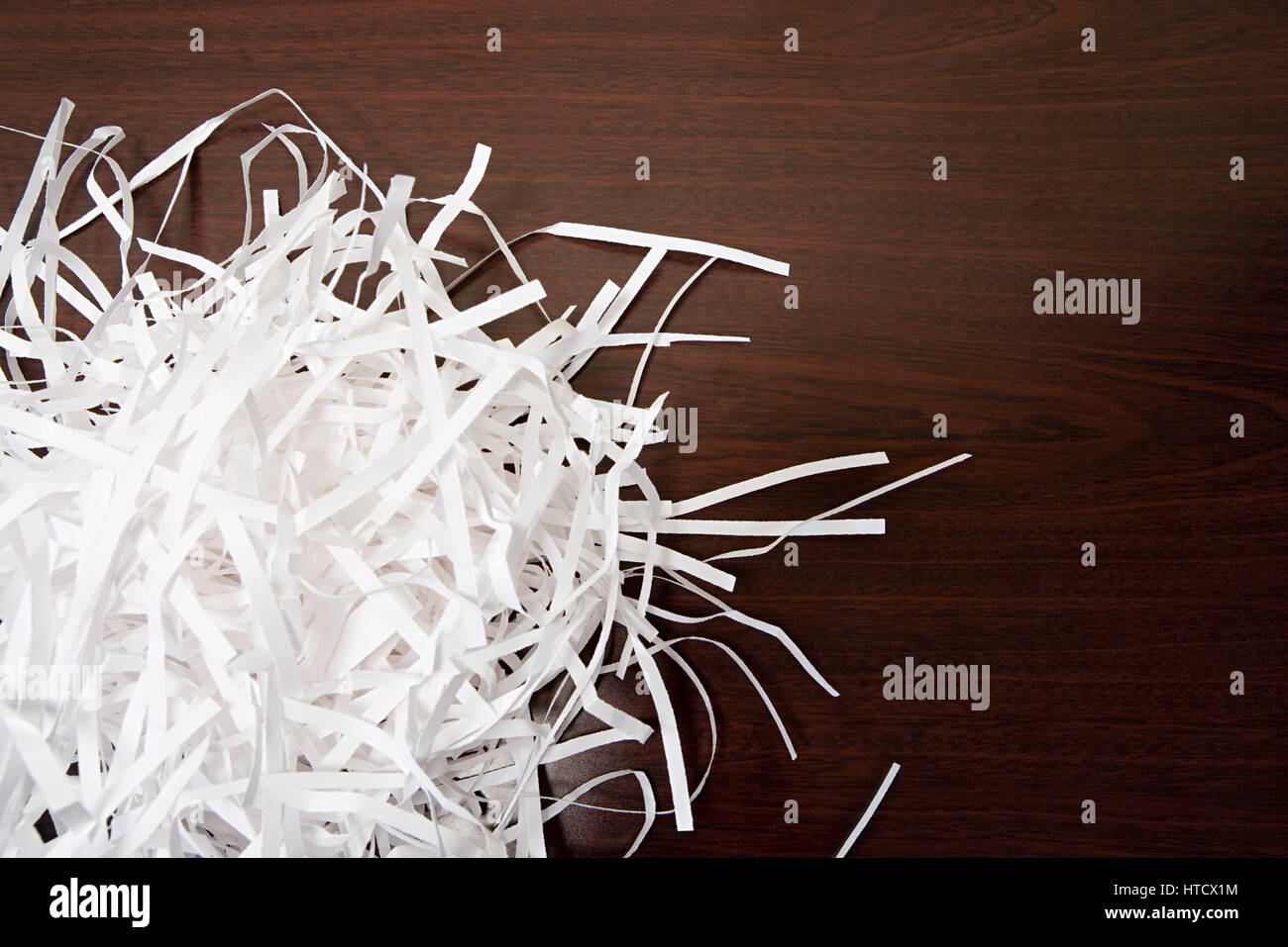 Shredded paper on a desk Stock Photo - Alamy