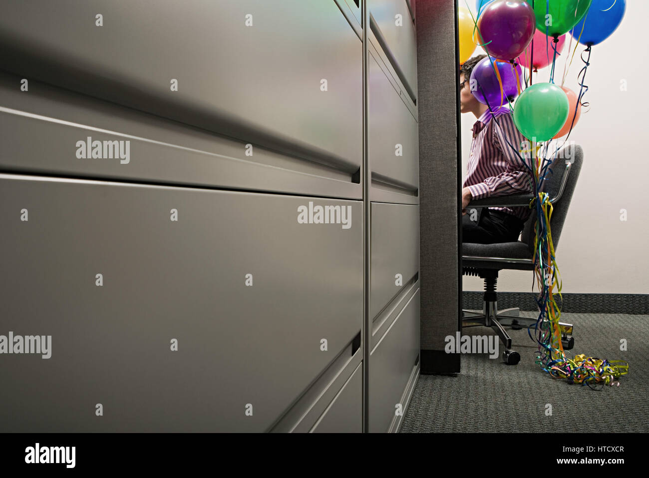 Bunch balloons on chair hi-res stock photography and images - Alamy