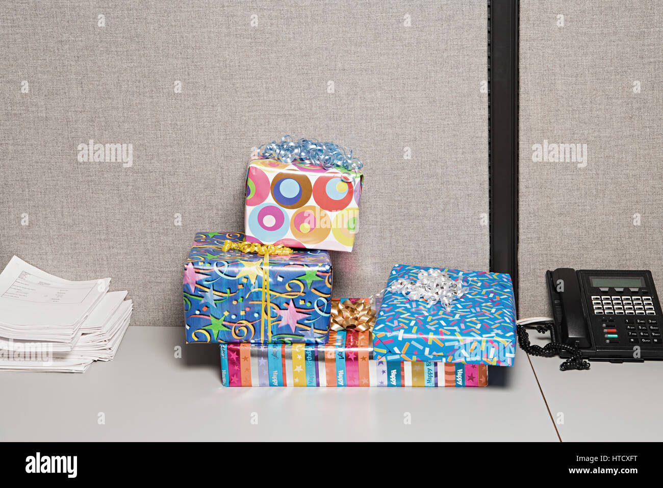 Presents on office desk Stock Photo - Alamy