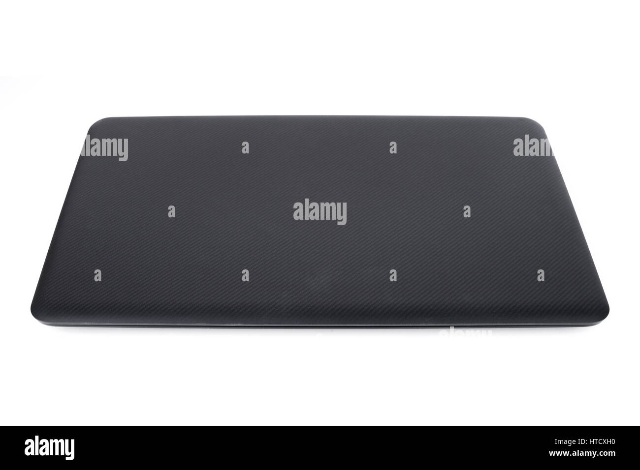 Closed laptop isolated on a white background Stock Photo - Alamy