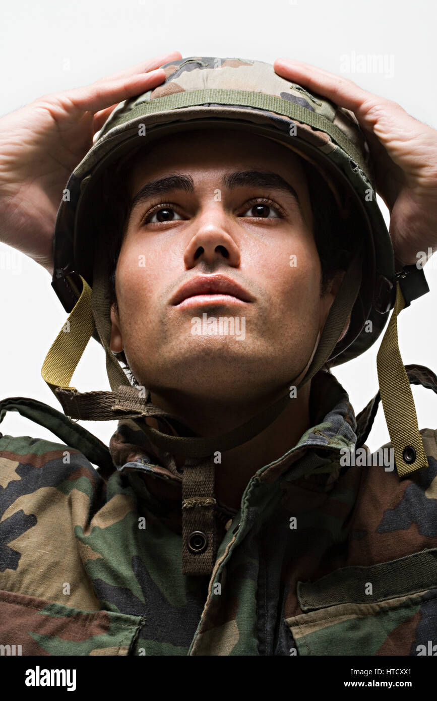 Portrait of young male soldier Stock Photo - Alamy