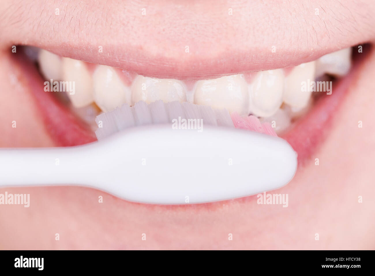 close up of mouth brushing teeth Stock Photo - Alamy