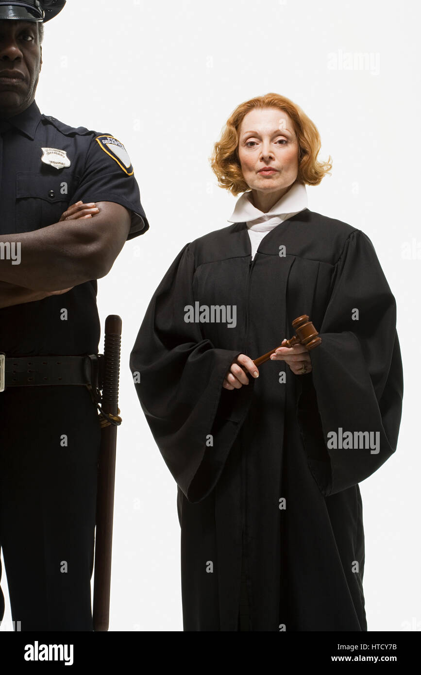 Portrait of a police officer and a judge Stock Photo - Alamy