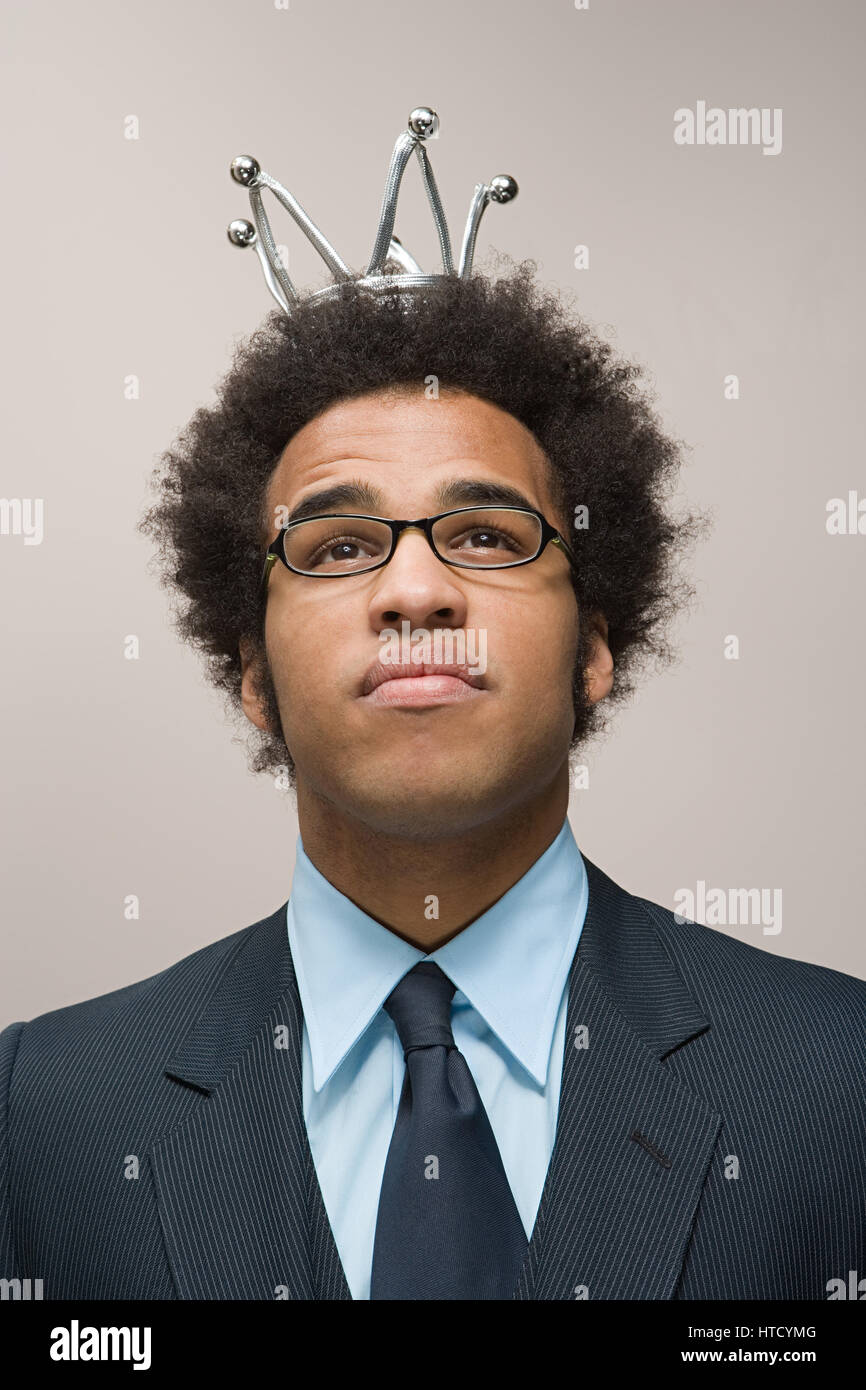 Office worker wearing a crown Stock Photo - Alamy