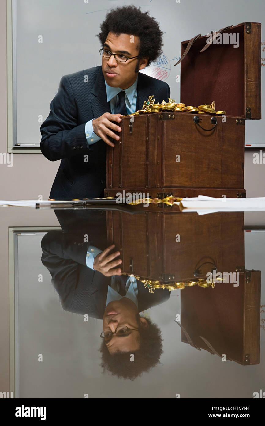 man looking sneaking Stock Photo - Alamy