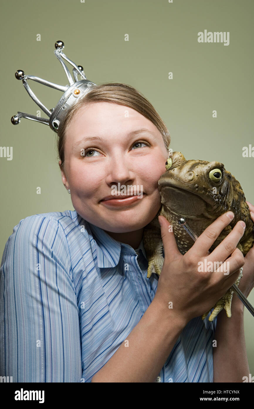 Office worker and frog Stock Photo - Alamy