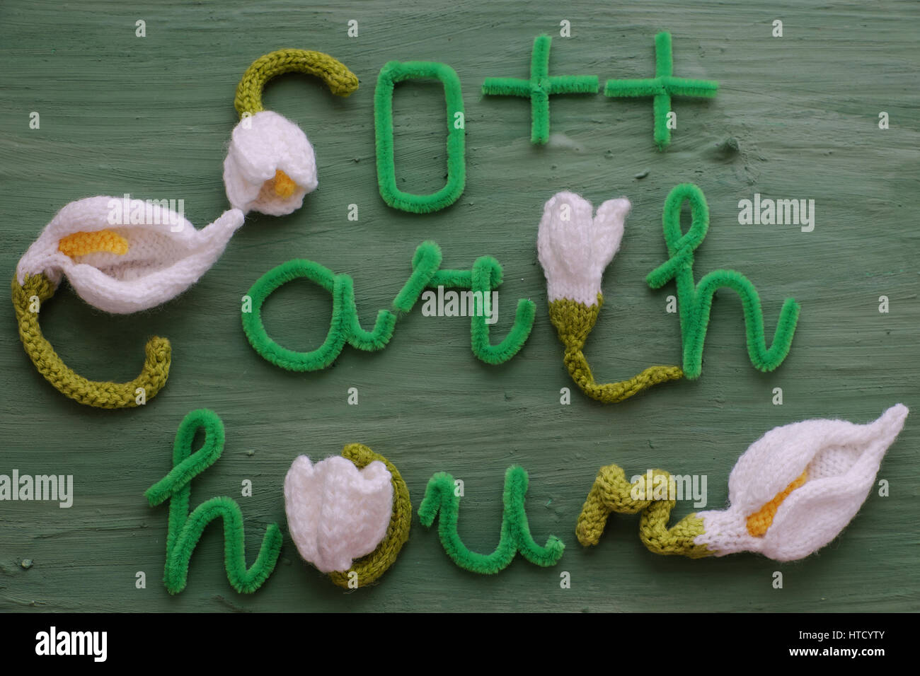 Earth hour message on green background, remind people give hand save ...