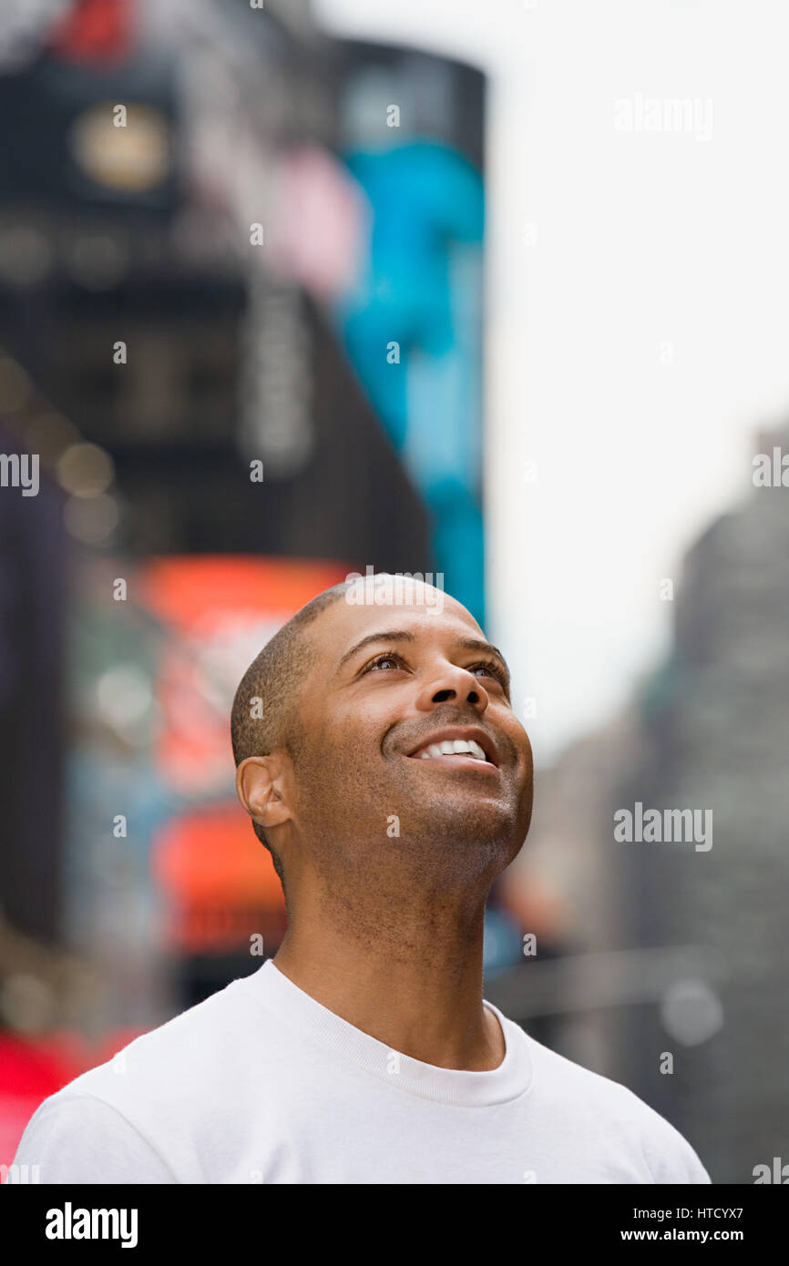 Man looking up Stock Photo - Alamy