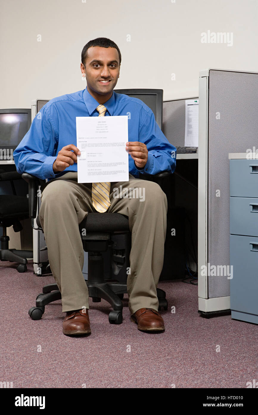 Man with his resume Stock Photo - Alamy