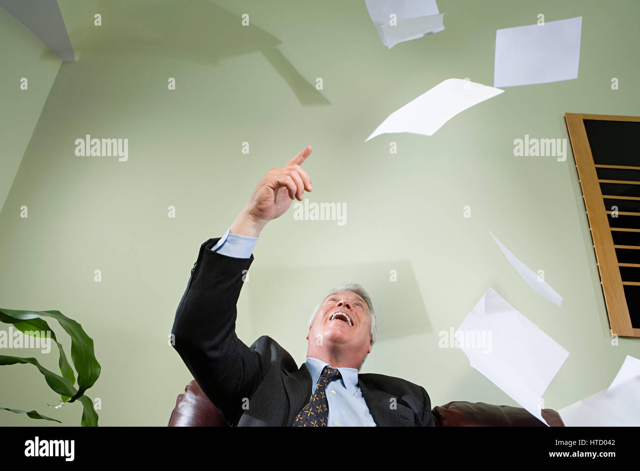Paper in the air hi-res stock photography and images - Alamy