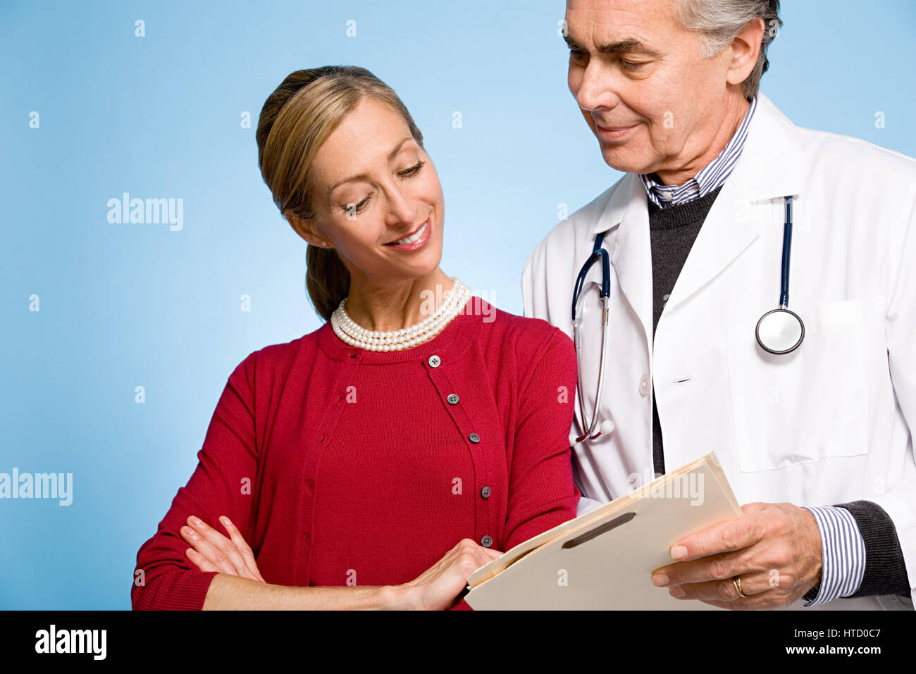 Doctor and patient Stock Photo - Alamy