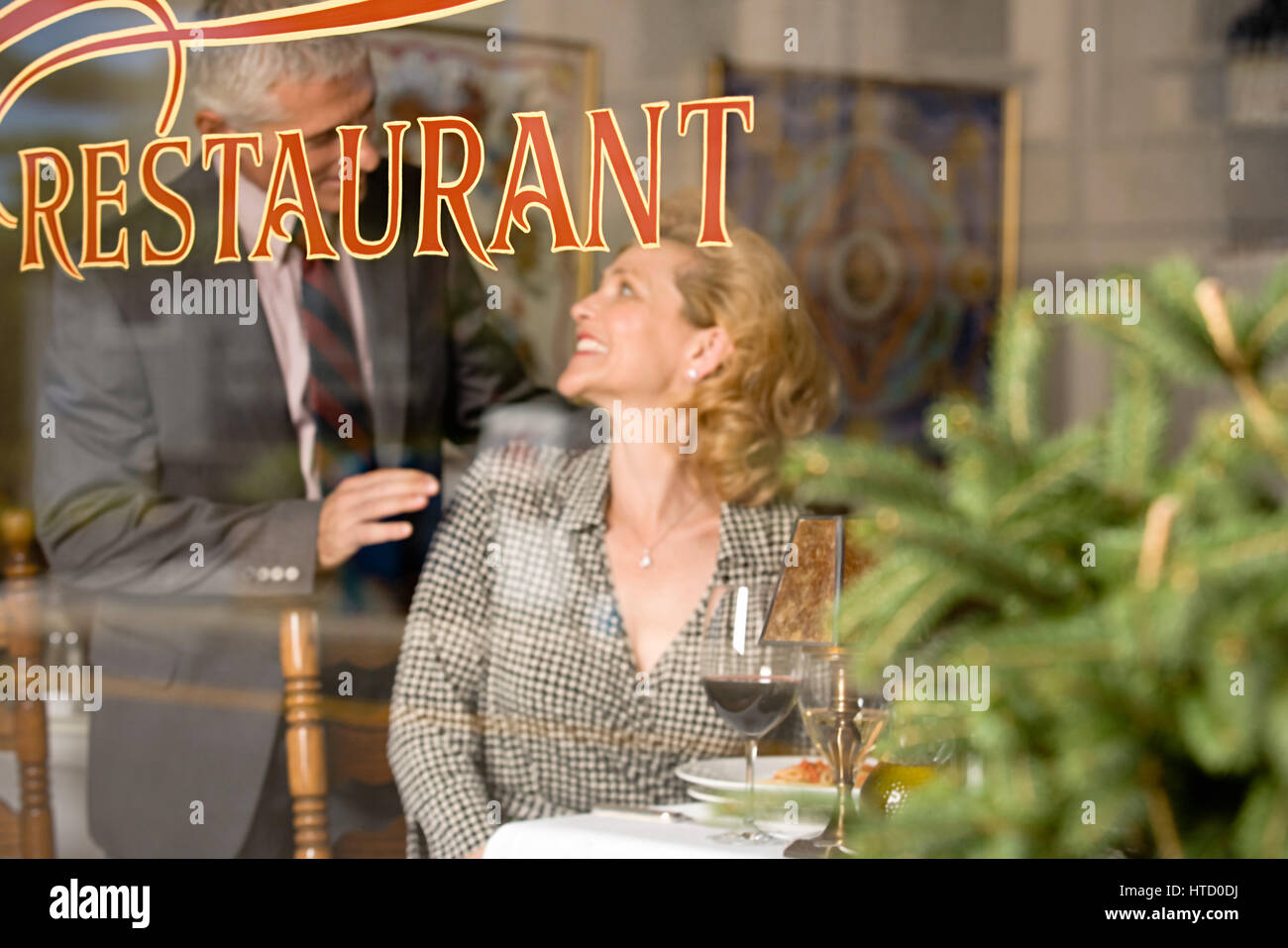Couple arrive to restaurant hi-res stock photography and images - Alamy