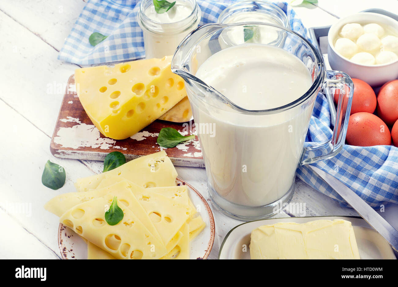 Set of fresh dairy products on a white wooden table Stock Photo - Alamy