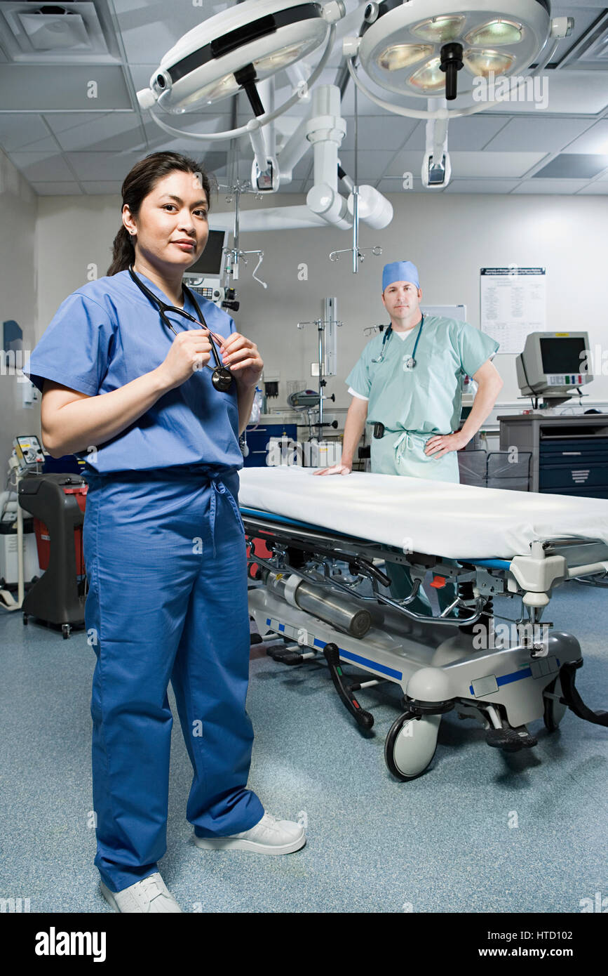 Surgeons in operating theatre Stock Photo - Alamy