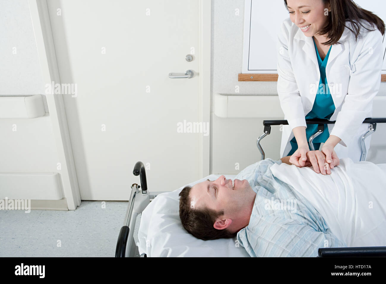 Doctor walking door hi-res stock photography and images - Alamy