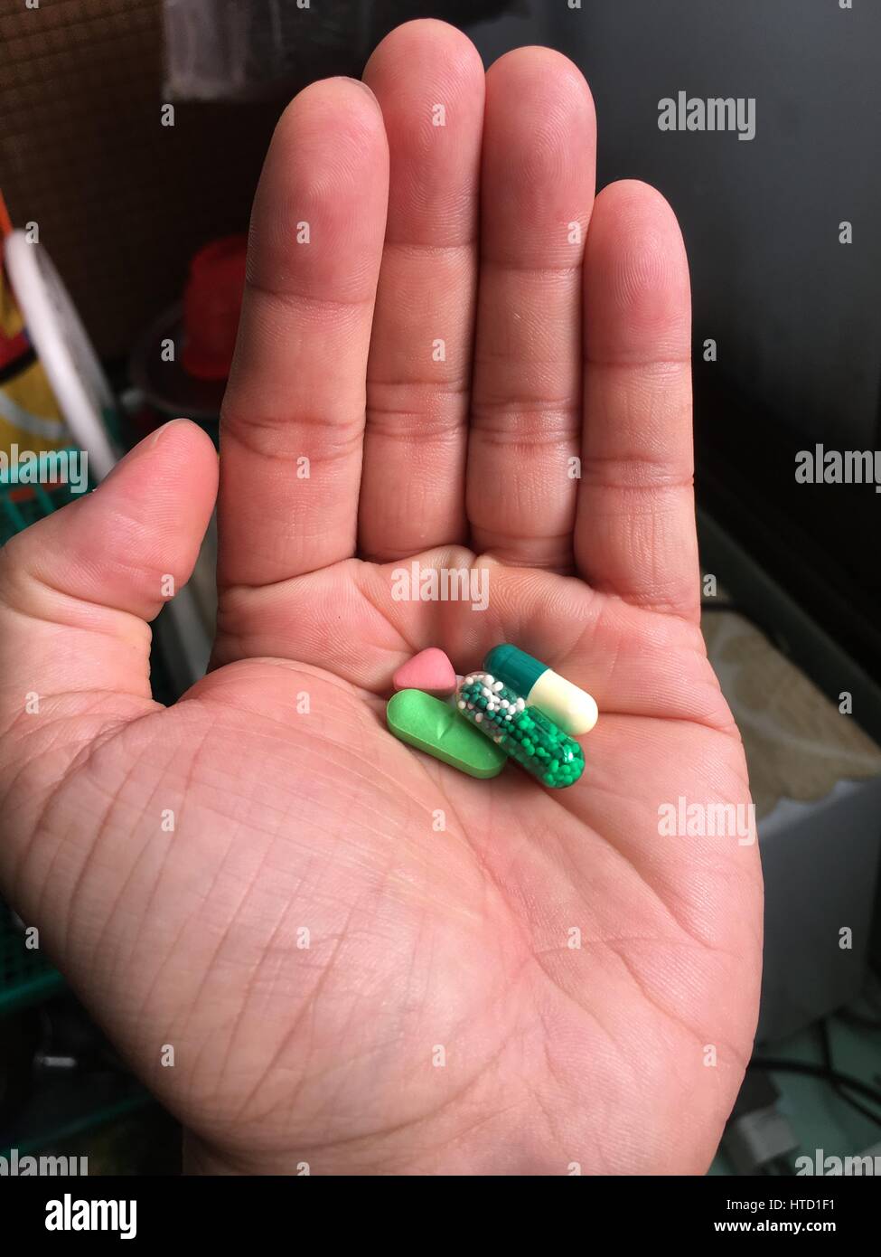 Medicine drug in hand Stock Photo - Alamy