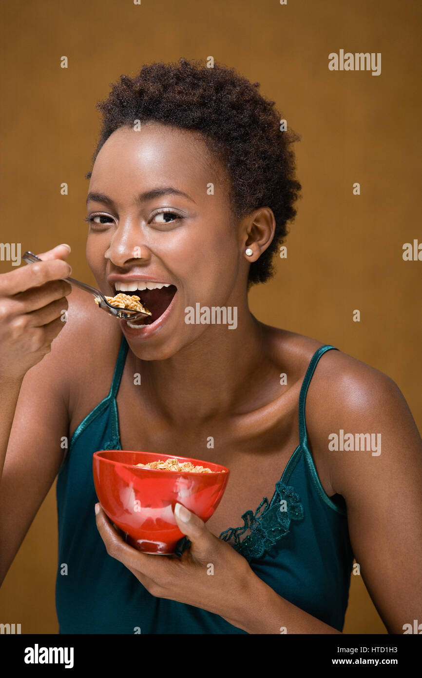 Woman cereal spoon mouth hi-res stock photography and images - Alamy
