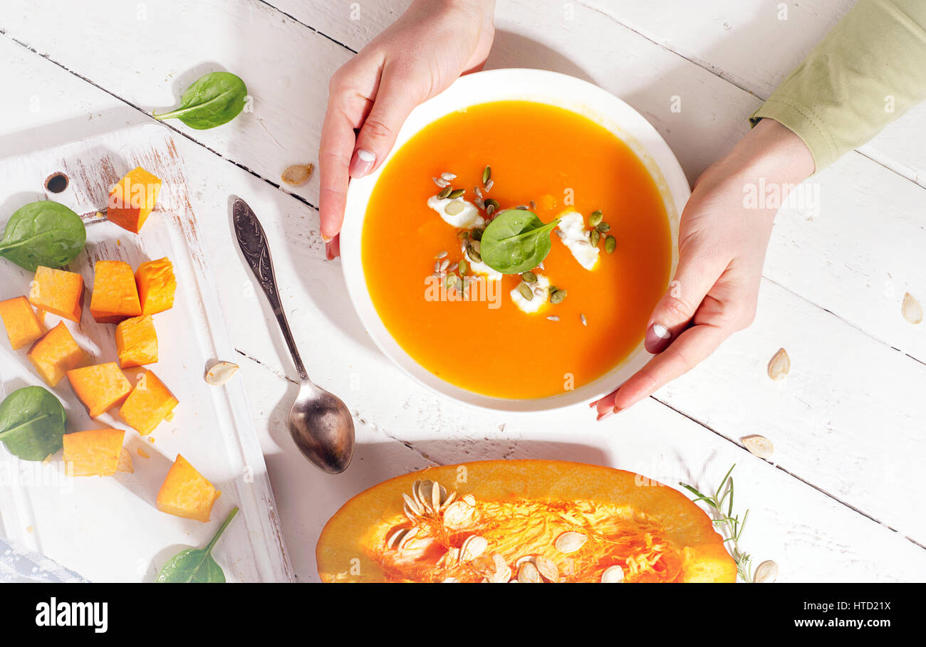 Hands holding bowl vegetable soup hi-res stock photography and images ...