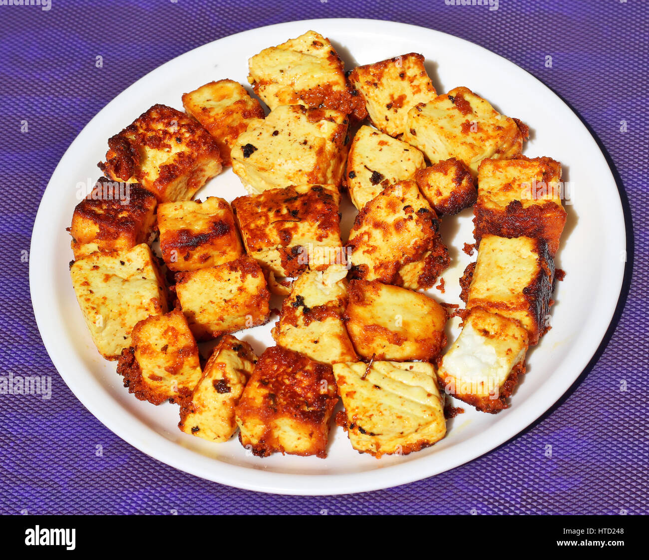 Fried paneer chunks Stock Photo - Alamy