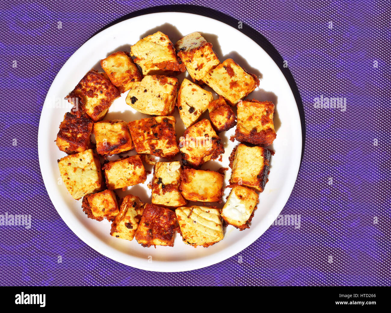 Fried paneer chunks Stock Photo - Alamy