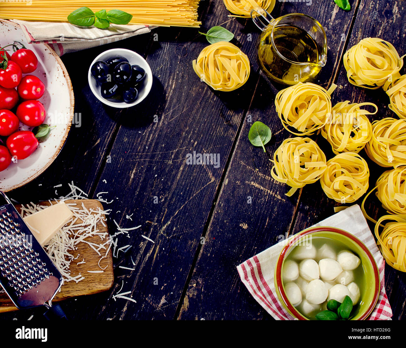 Italian food ingredients for cooking on a rustic wooden background. Top ...