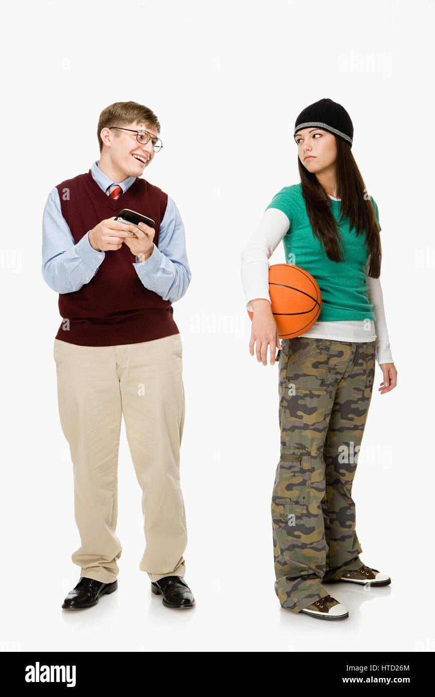 Geek and girl with basketball Stock Photo - Alamy