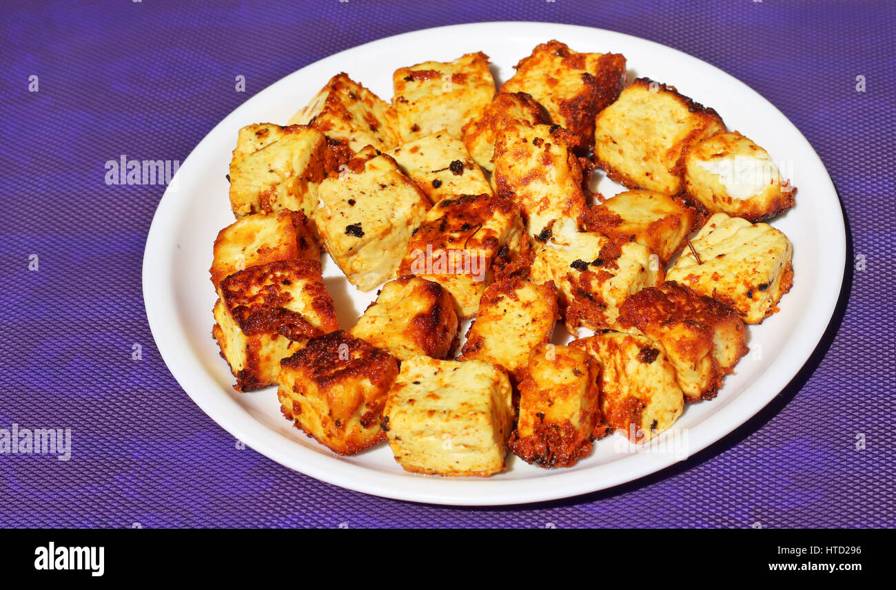 Fried paneer chunks Stock Photo - Alamy