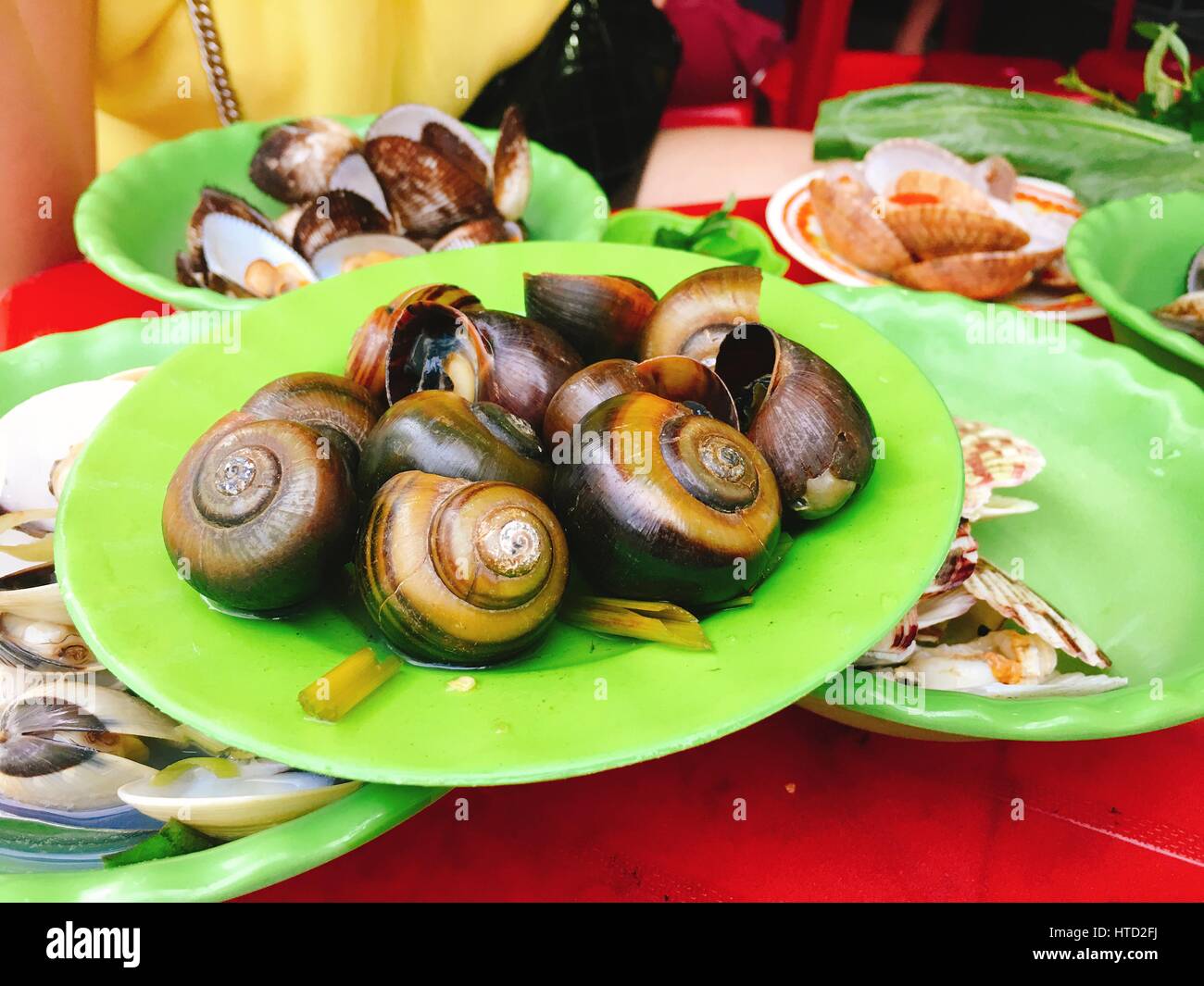 Vietnamese steamed snails on dish for street food Stock Photo - Alamy
