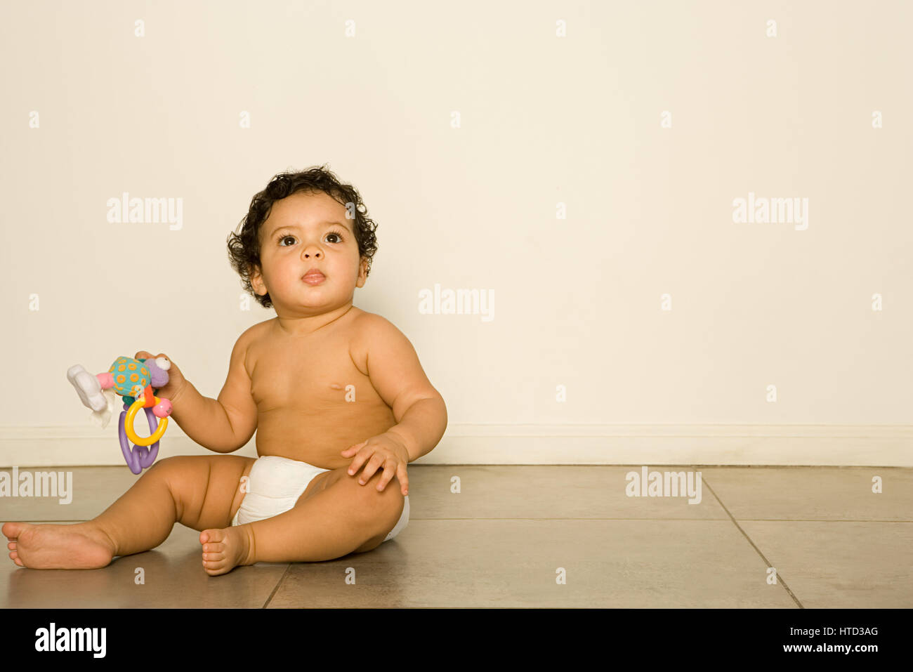 Holding rattle hi-res stock photography and images - Alamy