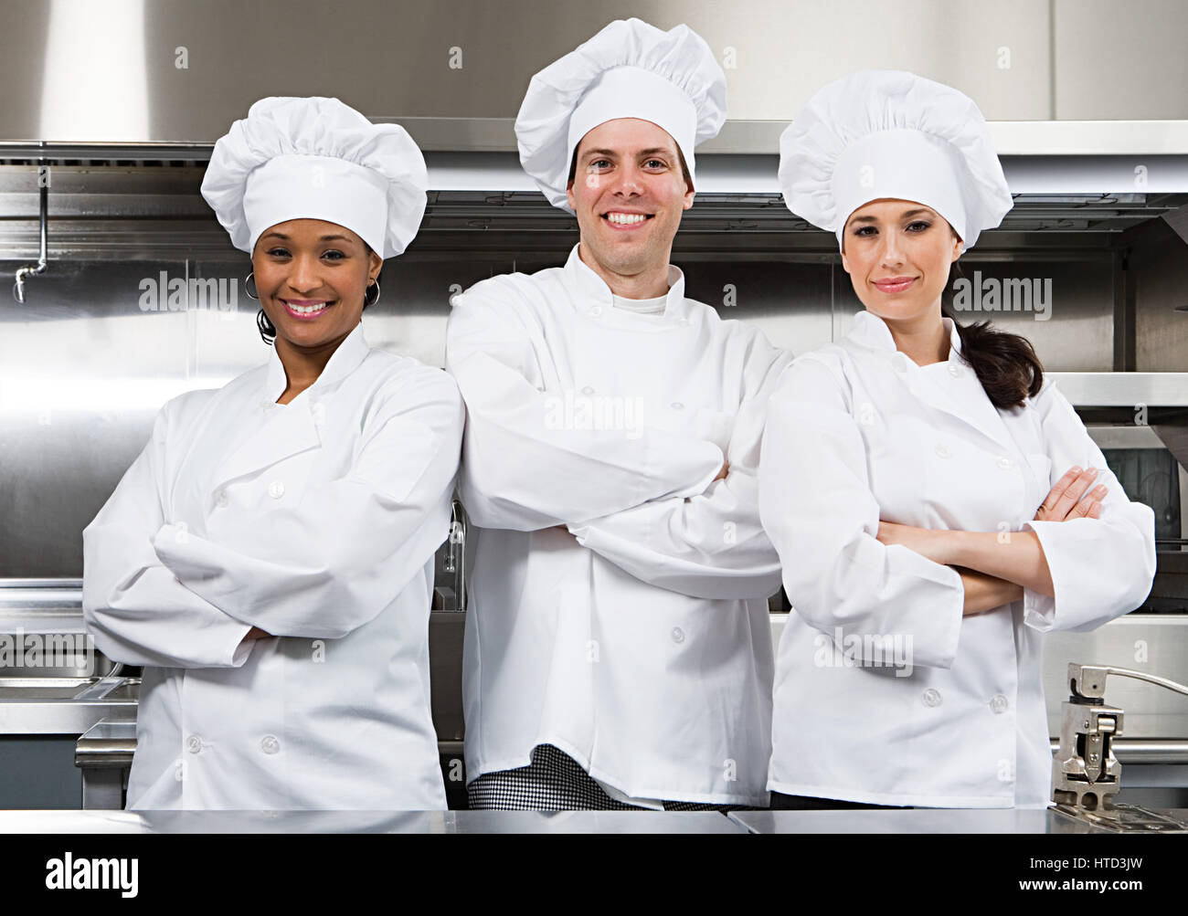 Happy team chefs looking camera hi-res stock photography and images - Alamy