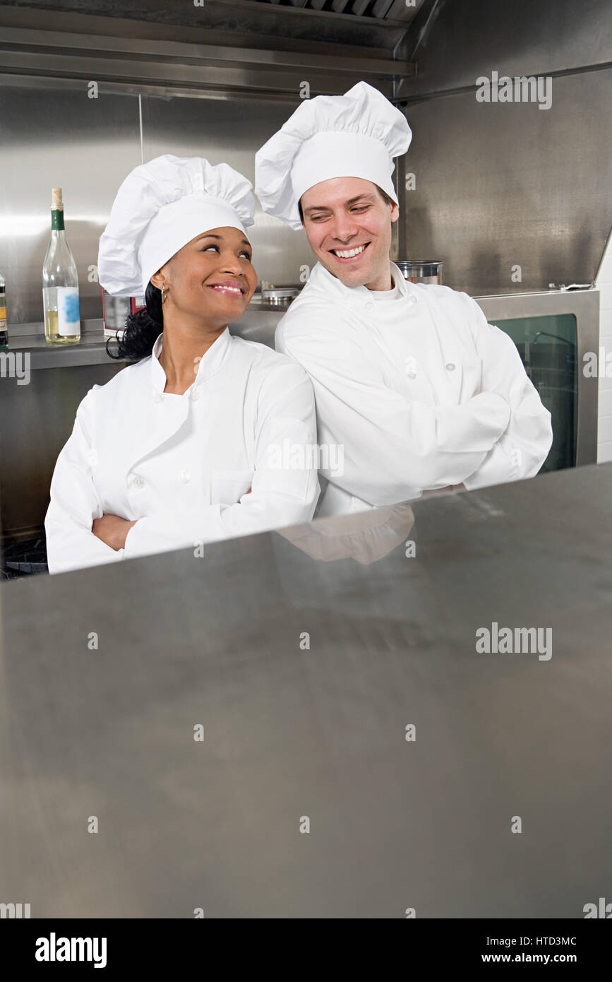 Happy team chefs looking camera hi-res stock photography and images - Alamy