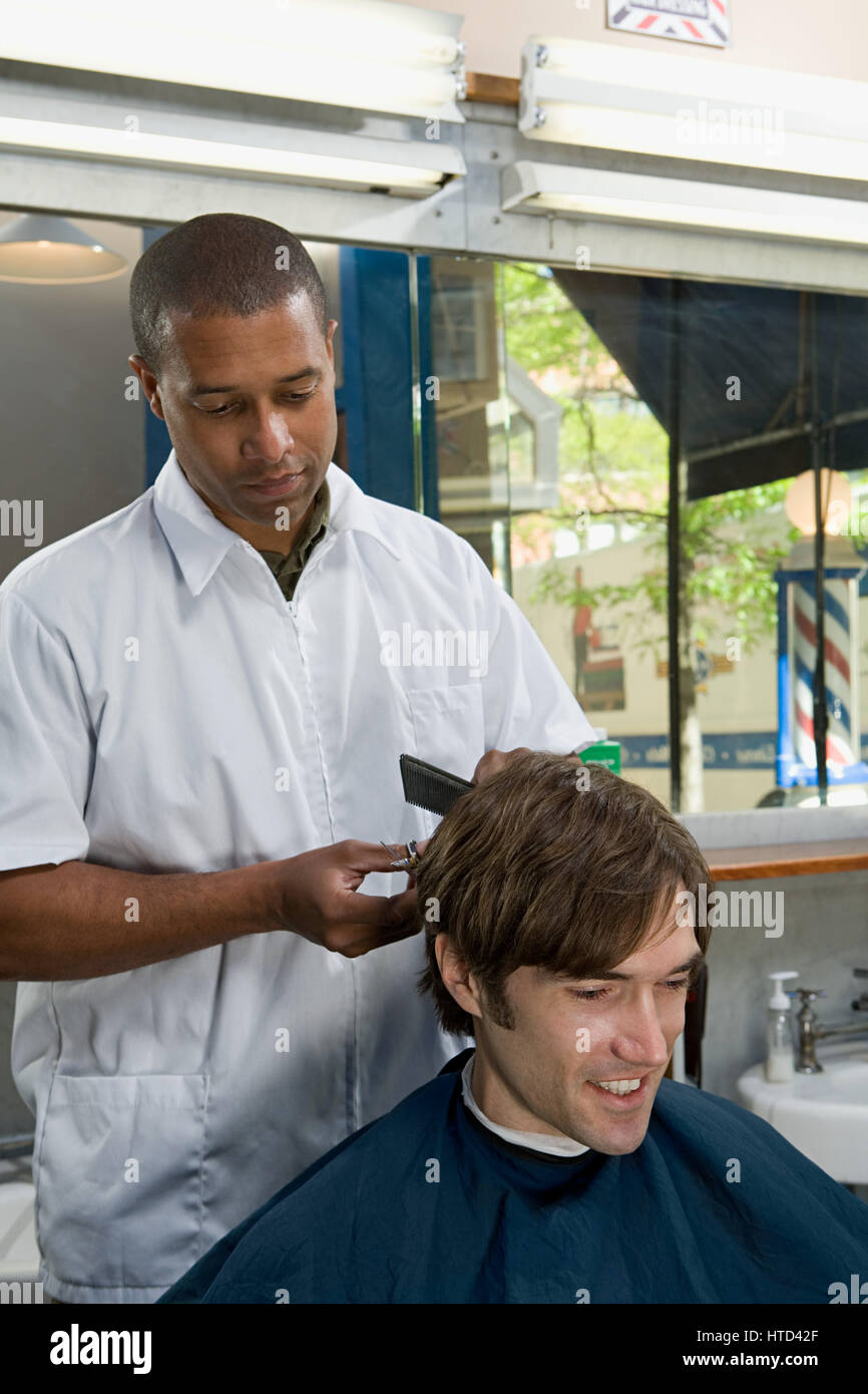 African american barber with scissors hi-res stock photography and ...