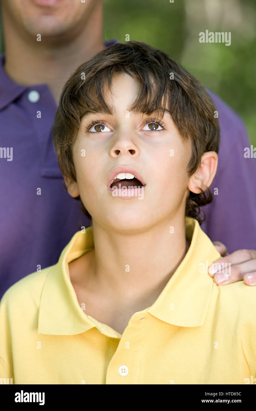 Boy looking up in wonder Stock Photo - Alamy