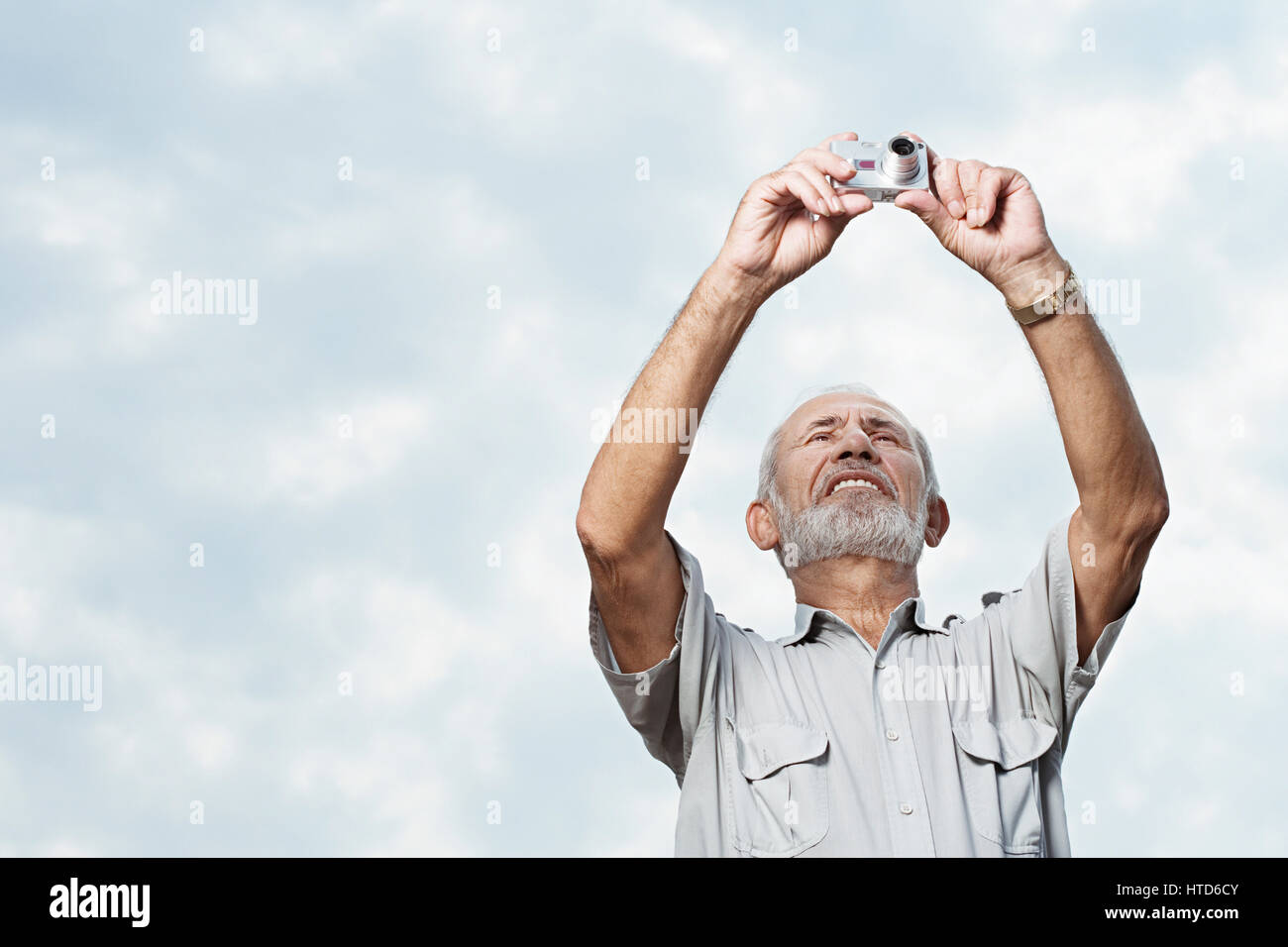 Man taking a picture Stock Photo - Alamy