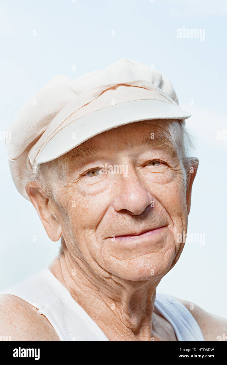Senior man wearing a cap Stock Photo - Alamy