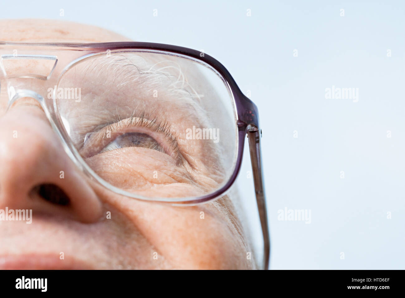 Senior man looking up Stock Photo - Alamy