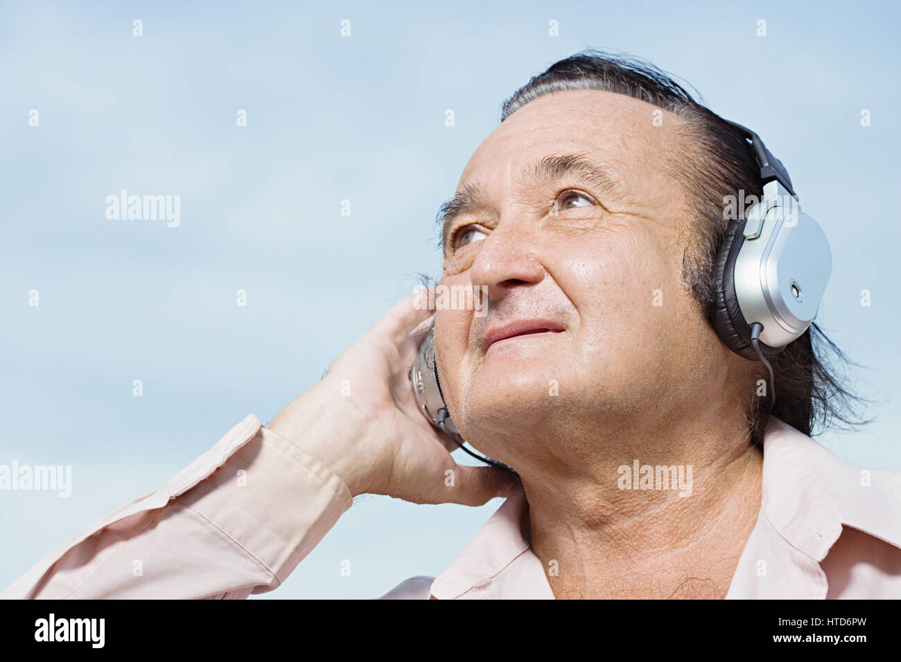 Man wearing headphones Stock Photo - Alamy