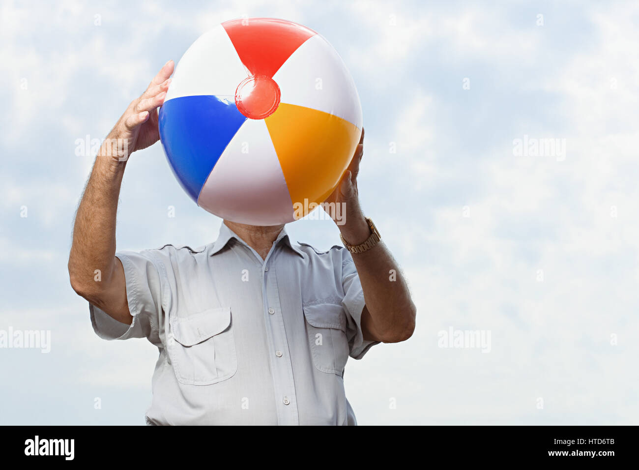 Holding beachball hi-res stock photography and images - Alamy