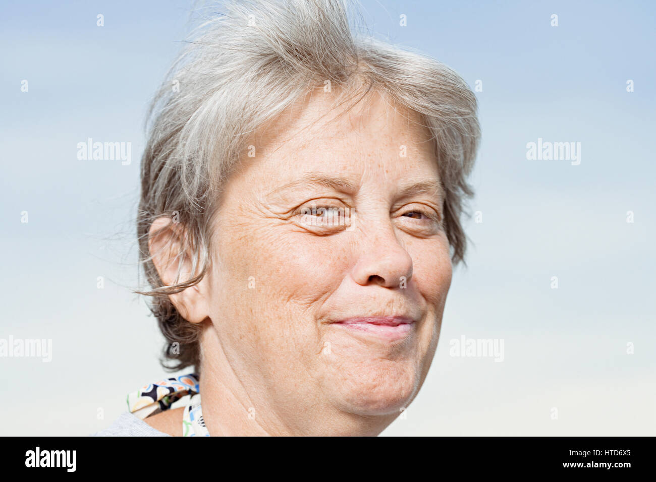 Woman smirking hi-res stock photography and images - Alamy