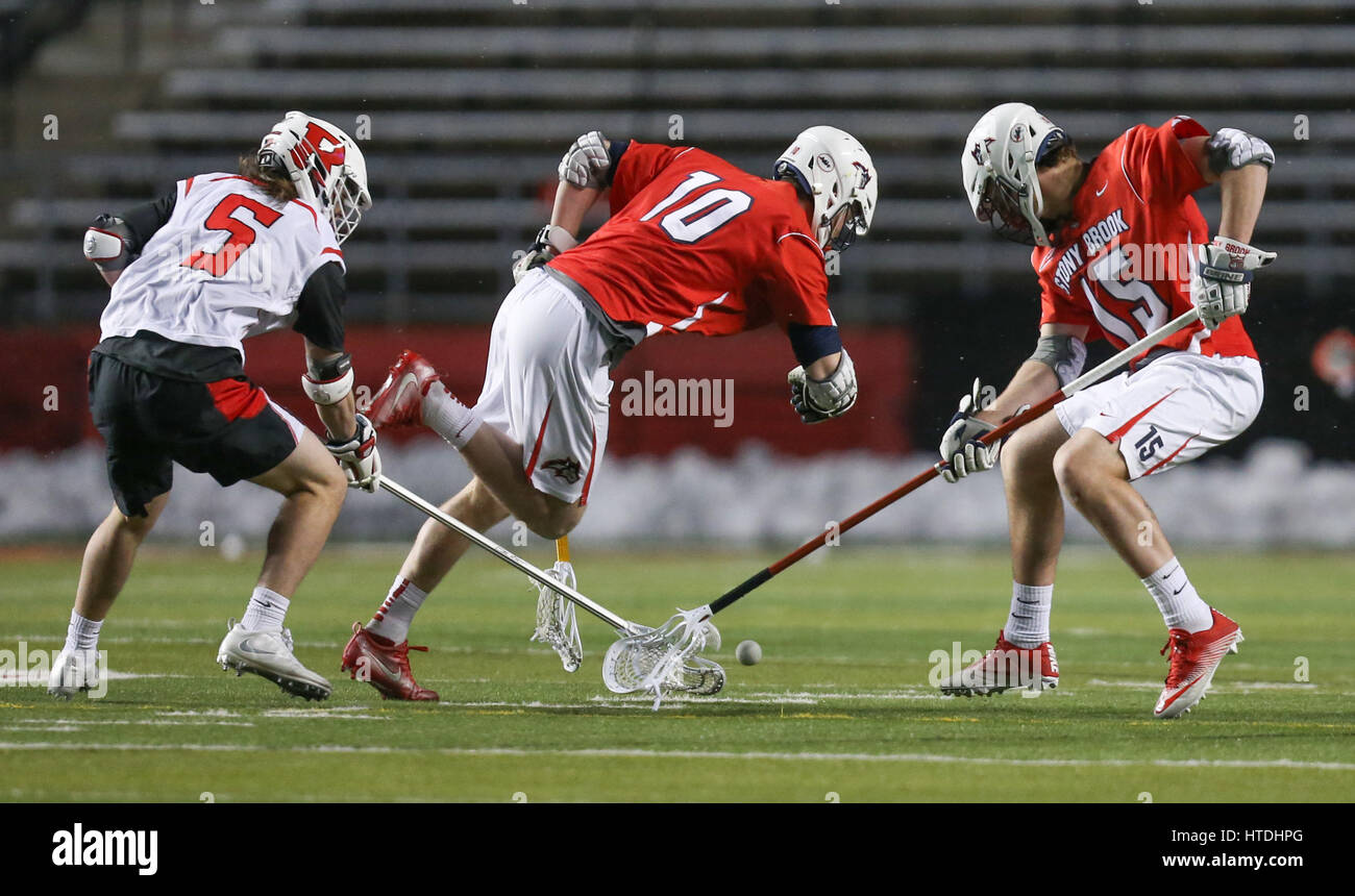 Piscataway, NJ, USA. 10th Mar, 2017. Rutgers Kyle Pless (5) and Stony ...
