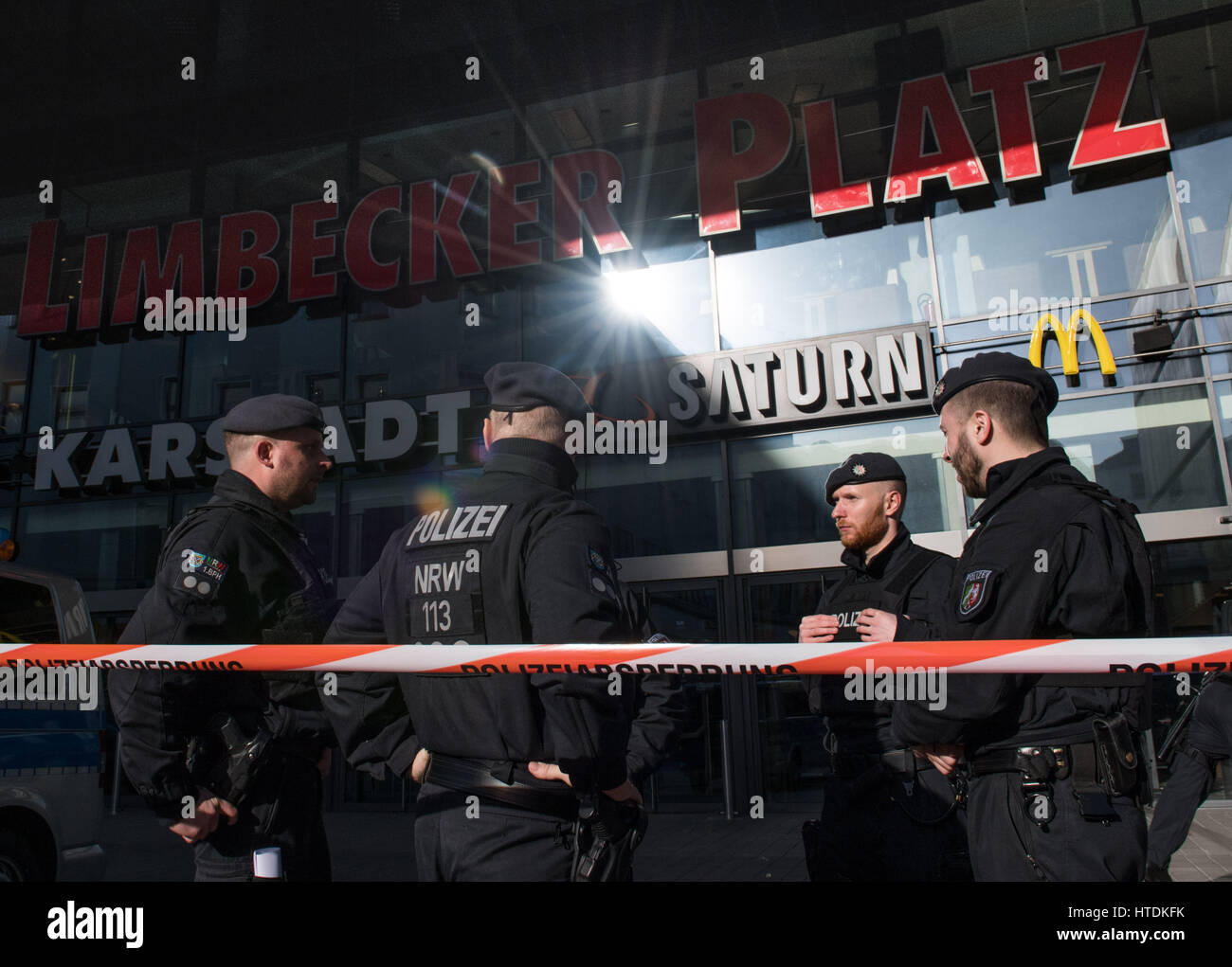 Essen, Germany. 11th Mar, 2017. Members of the German police secure the ...